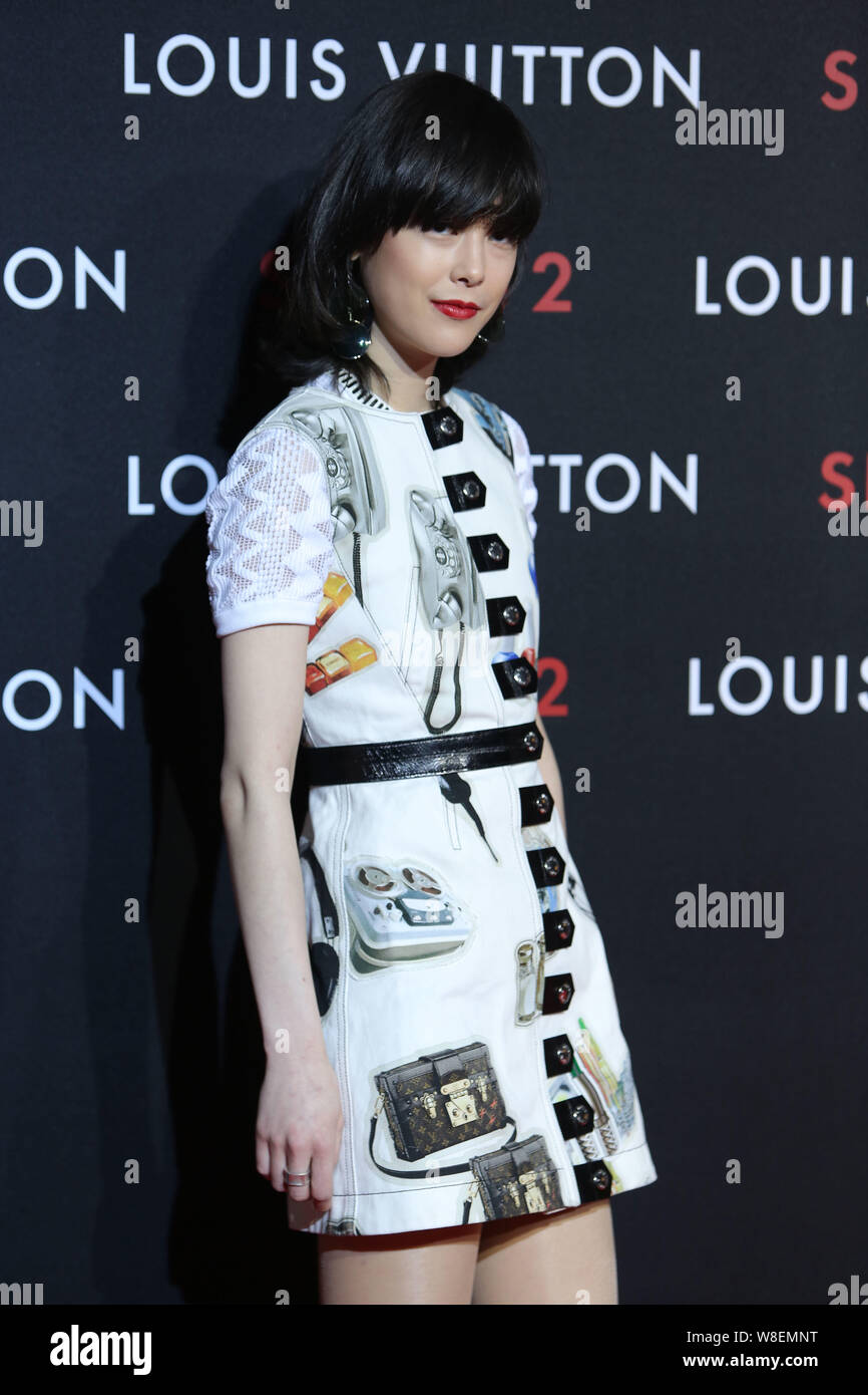 Chinese-Canadian model Mae Lapres poses on the red carpet for as she ...