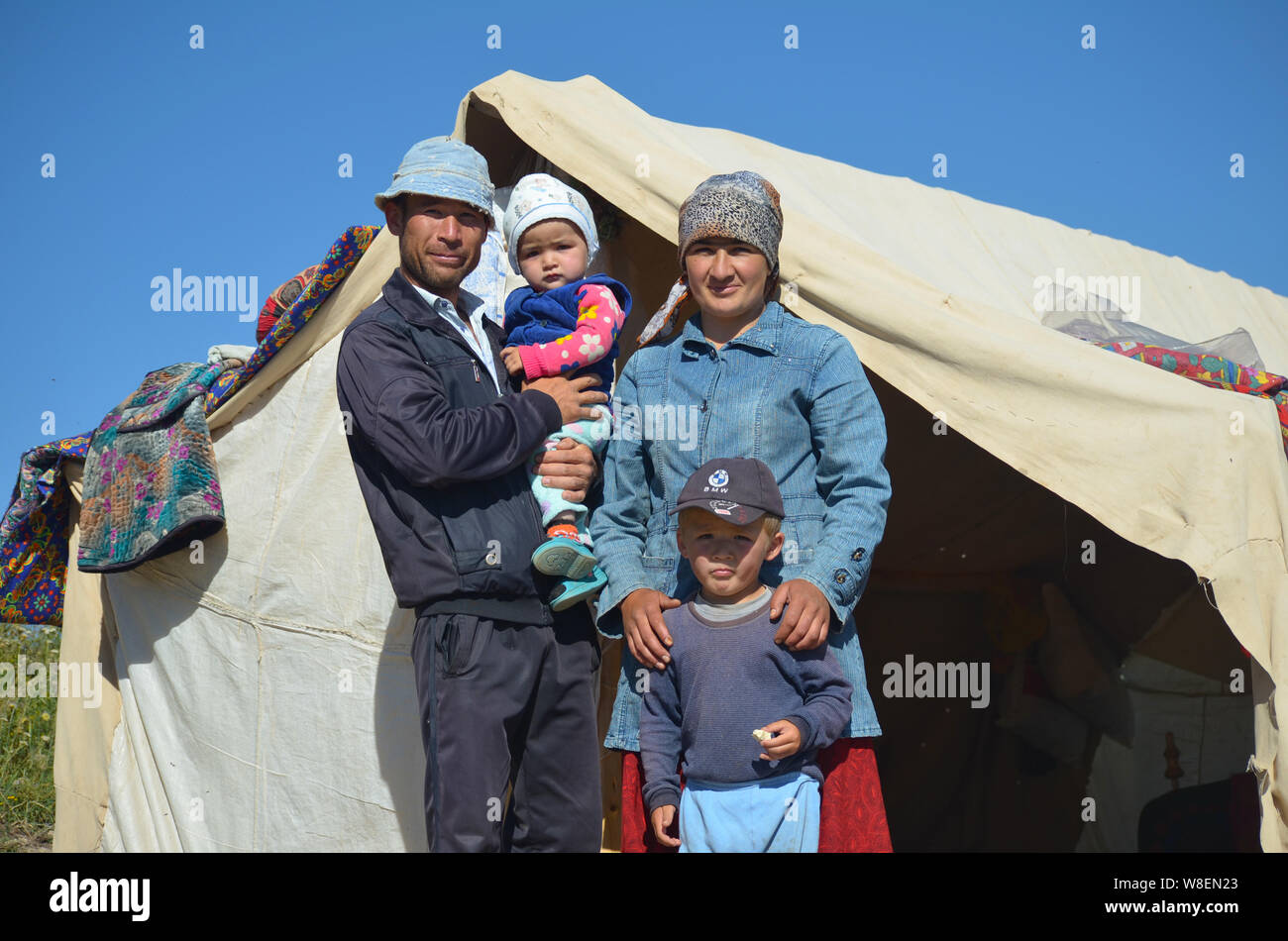 Nomadic shepherd family in their yurt at the Hissar mountains ...
