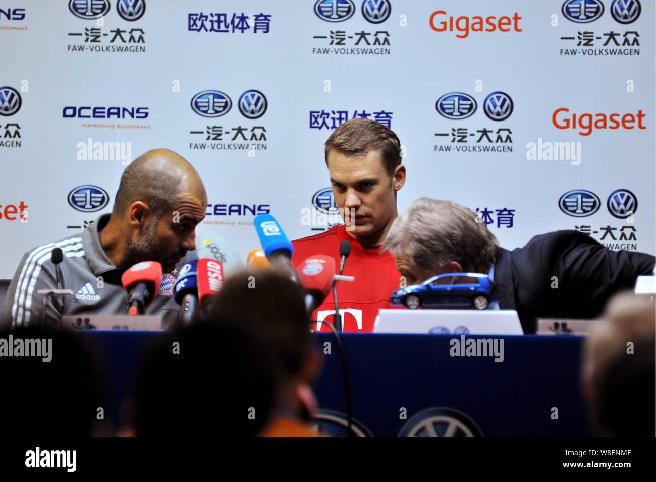 Head coach Pep Guardiola, left, and Manuel Neuer of Bayern Munich ...
