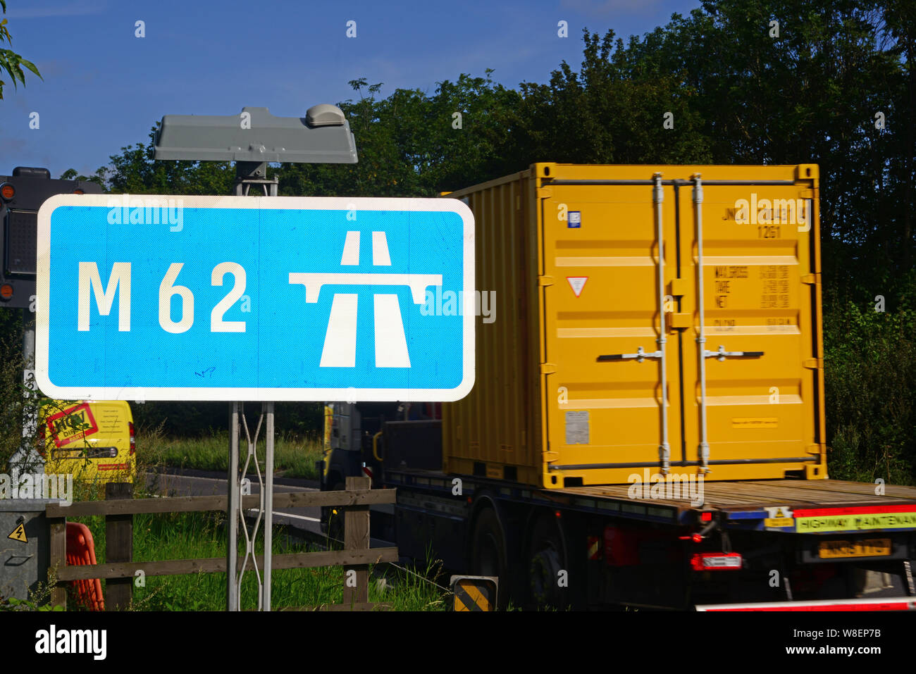 lorry passing m62 motorway sign at normanton junction leeds yorkshire ...