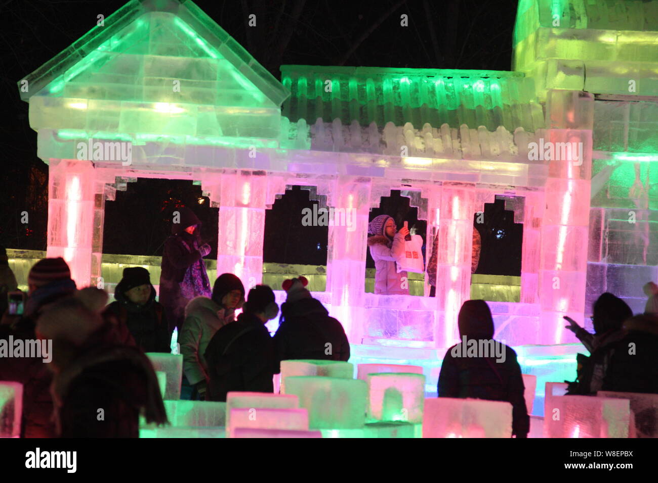 People visit ice sculptures ahead of the 42nd Harbin International Ice ...