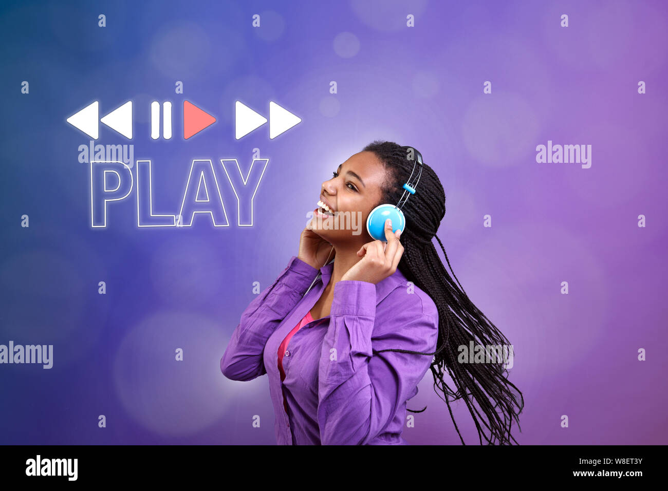 play music - happy young girl listening to music Stock Photo - Alamy