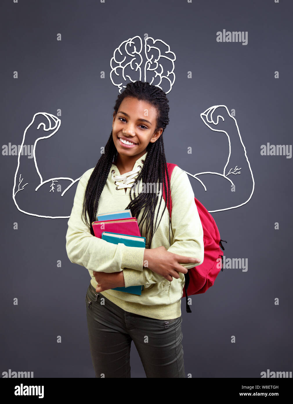Strong schoolgirl in class -Knowledge is power Stock Photo - Alamy