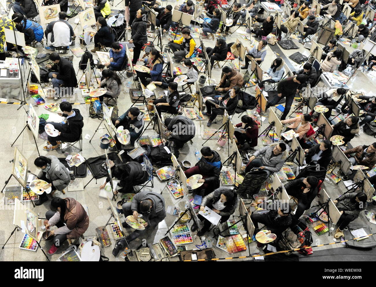 Chinese candidates are drawing as they take part in the entrance ...