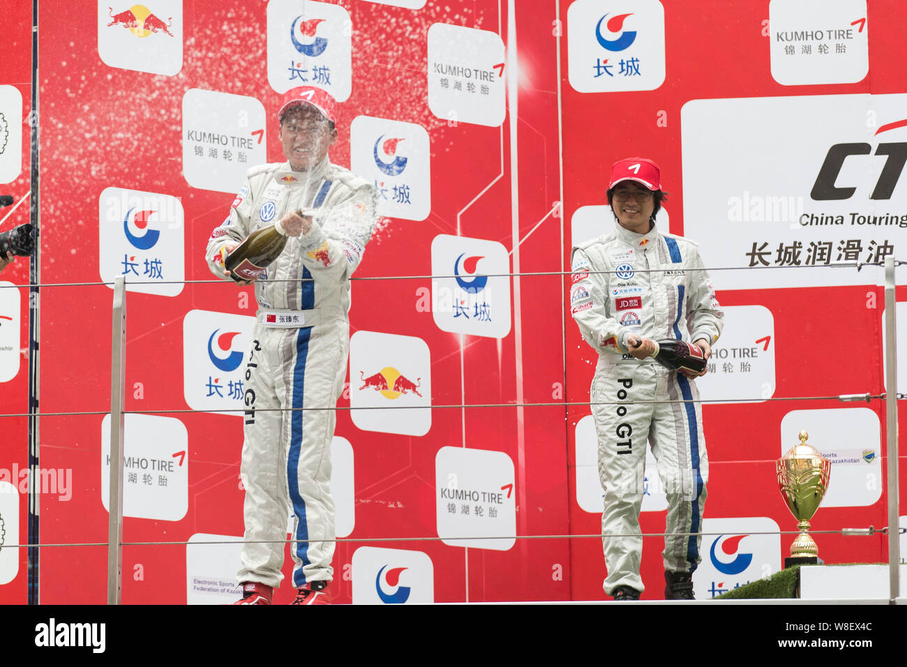 Chinese author and racer Han Han, right, and champion Zhang Zhendong ...