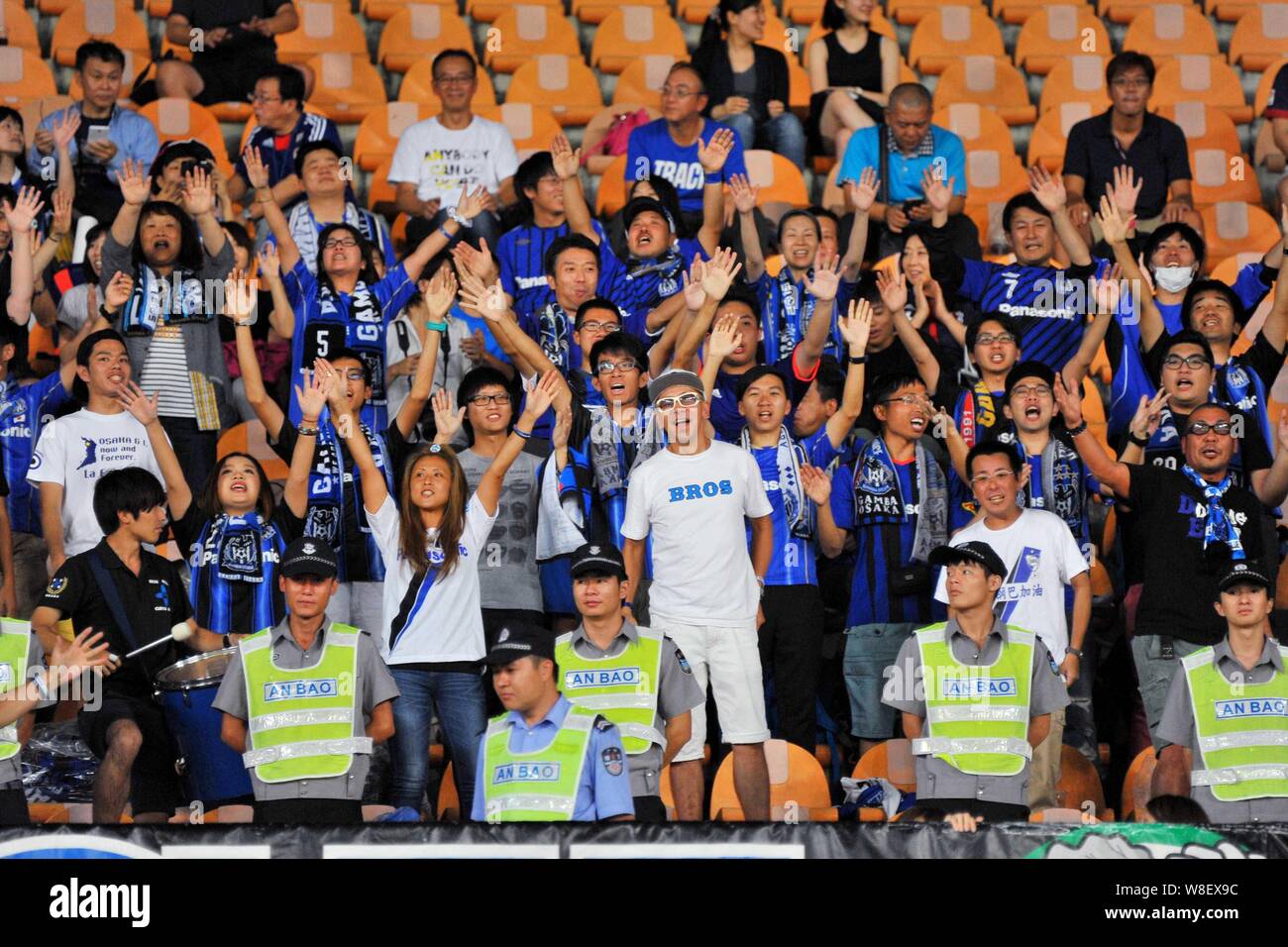 Japanese football fans show their support for Gamba Osaka in the first ...