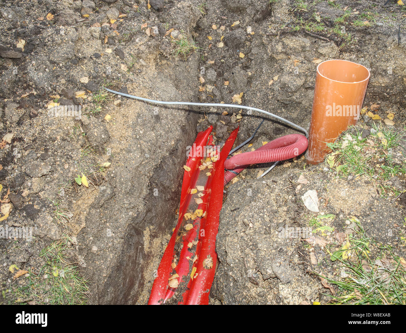 Steel wire in protective lplastipipe under ground. Construction Area ...