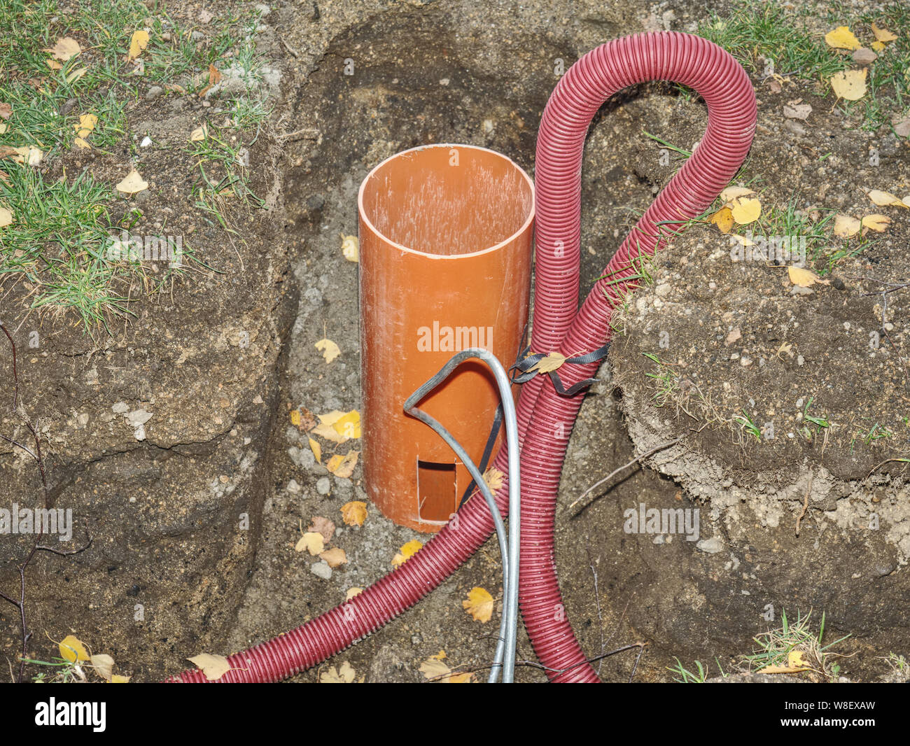 Wire protection for city light system in park. Steel grounding cable in ...