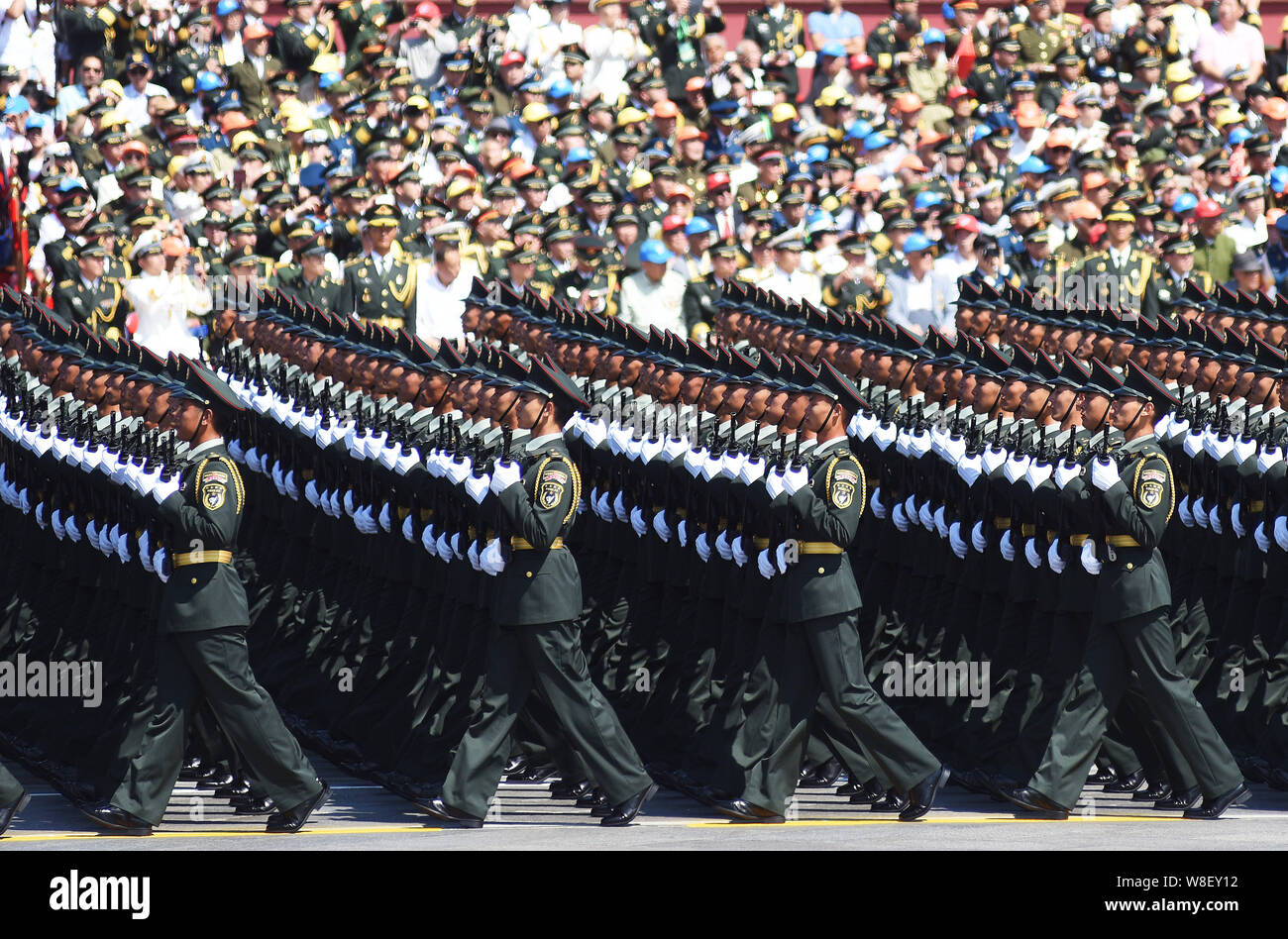 Chinese PLA (People's Liberation Army) soldiers march past the Tian ...