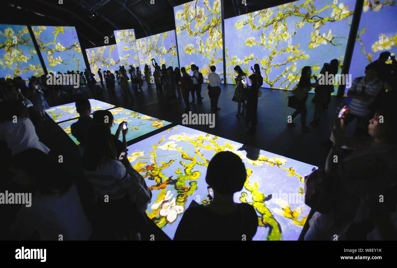 Visitors enjoy a multimedia exhibit of Dutch artist Vincent Van Gogh¯s ...