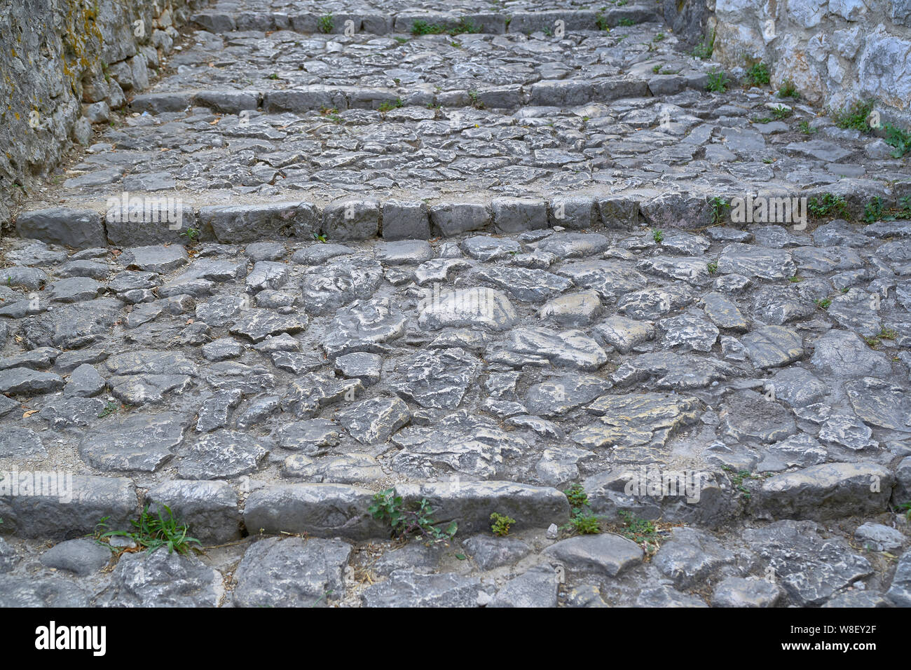 Stairs made of stones in a medieval city Stock Photo - Alamy