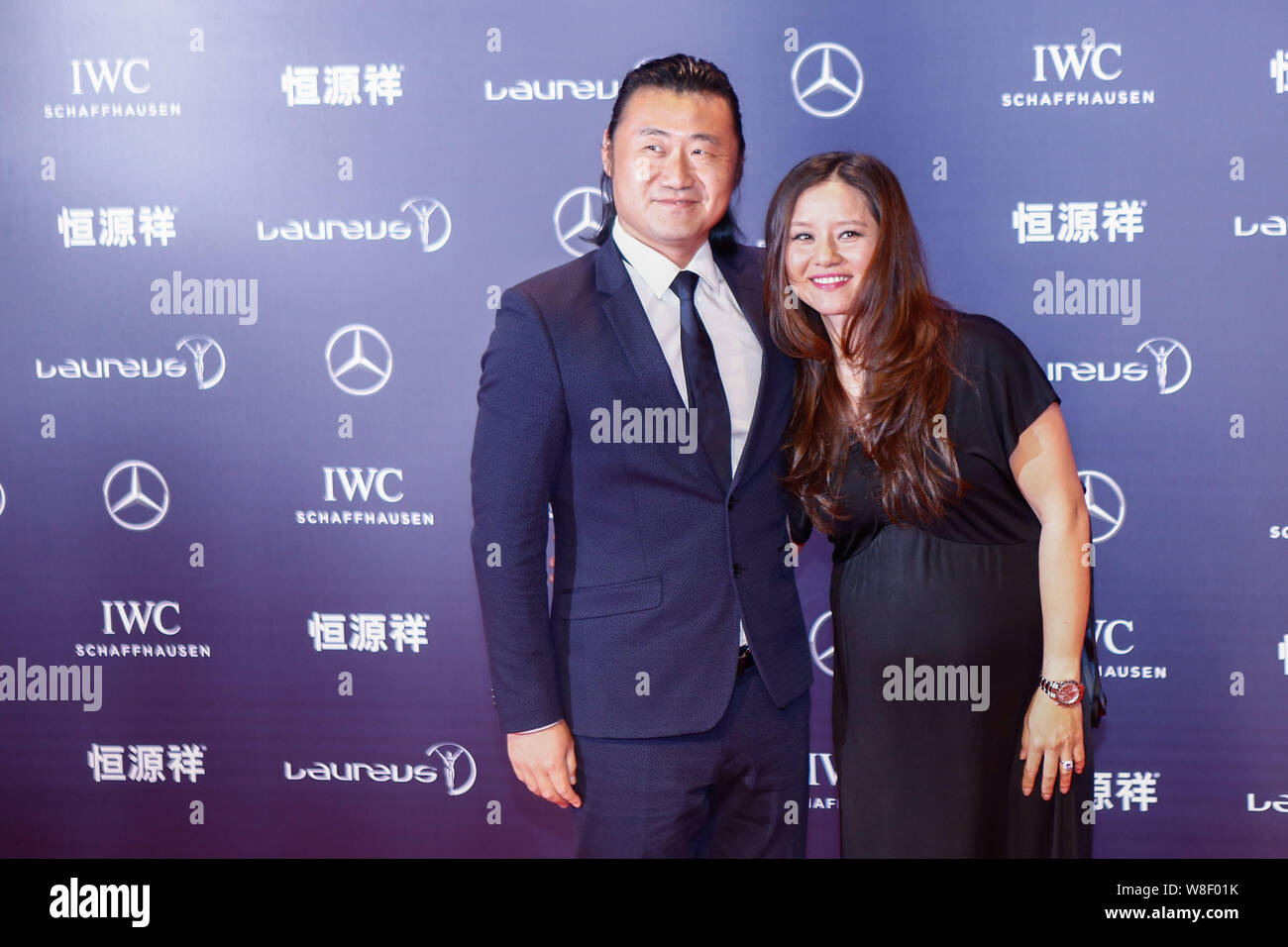Pregnant Chinese tennis star Li Na, right, and her husband Jiang Shan ...