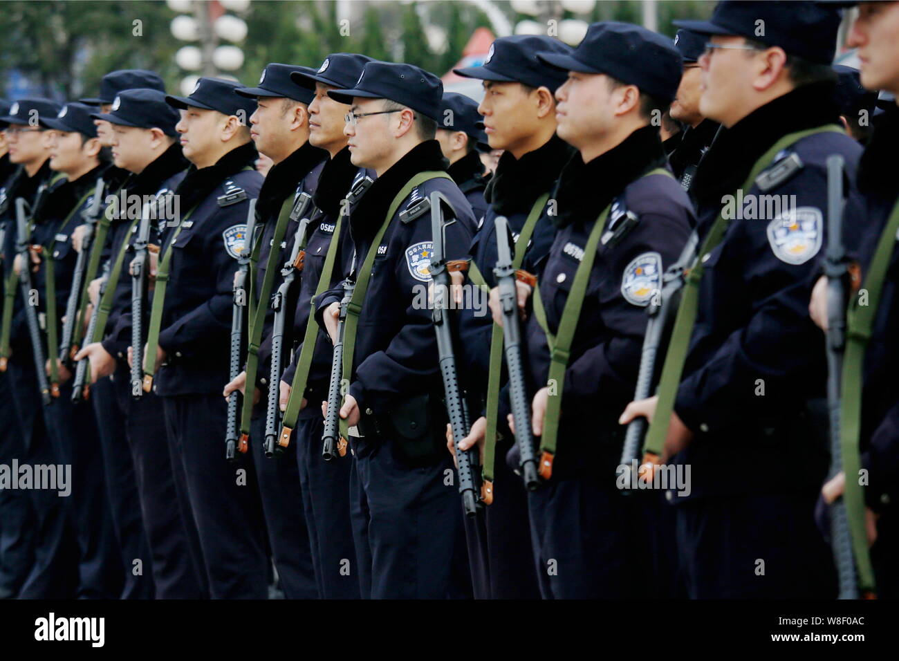 --FILE--Armed Chinese policemen of a Police Tactical Unit (PTU) line up ...