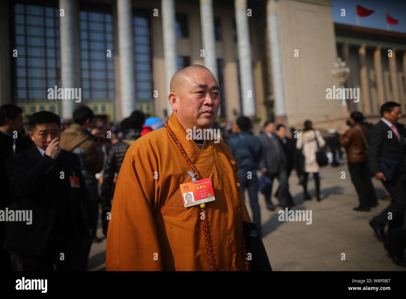 Abbot Shi Yongxin of Shaolin Temple, front, leaves the Great Hall of ...