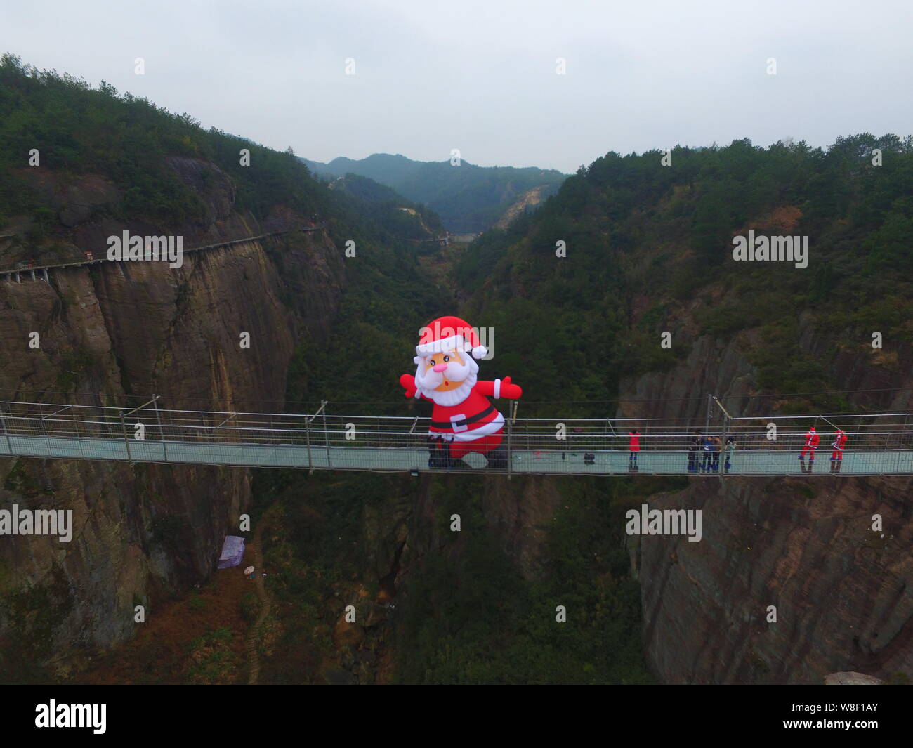 A 10-meter-tall 'Santa Claus' is pictured on the 180-meter-high and 300 ...
