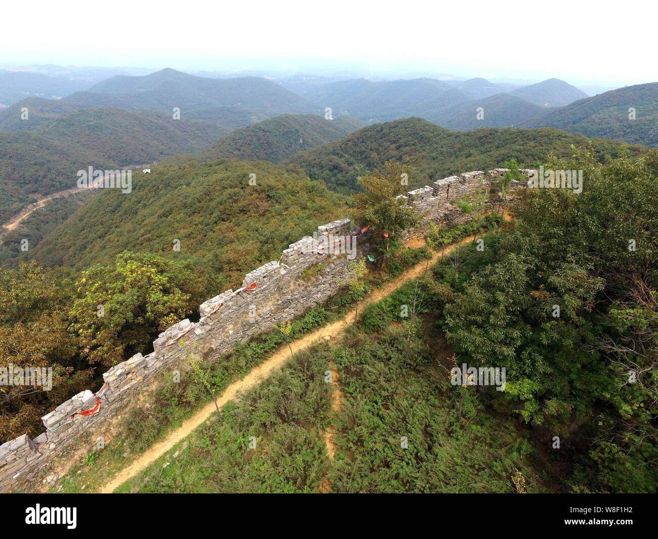 View of an ancient stone wall of Ming Dynasty (1368-1644) in a mountain ...