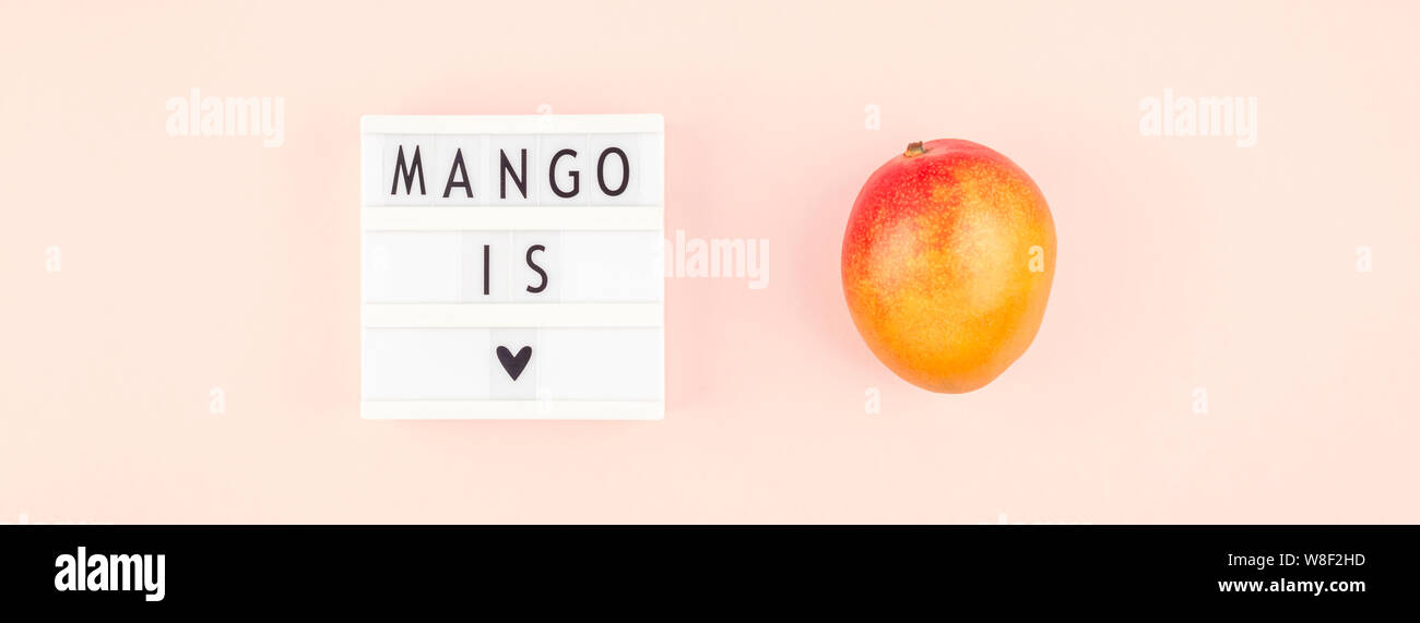 Mango fruit in creative conceptual top view flat lay composition with ...