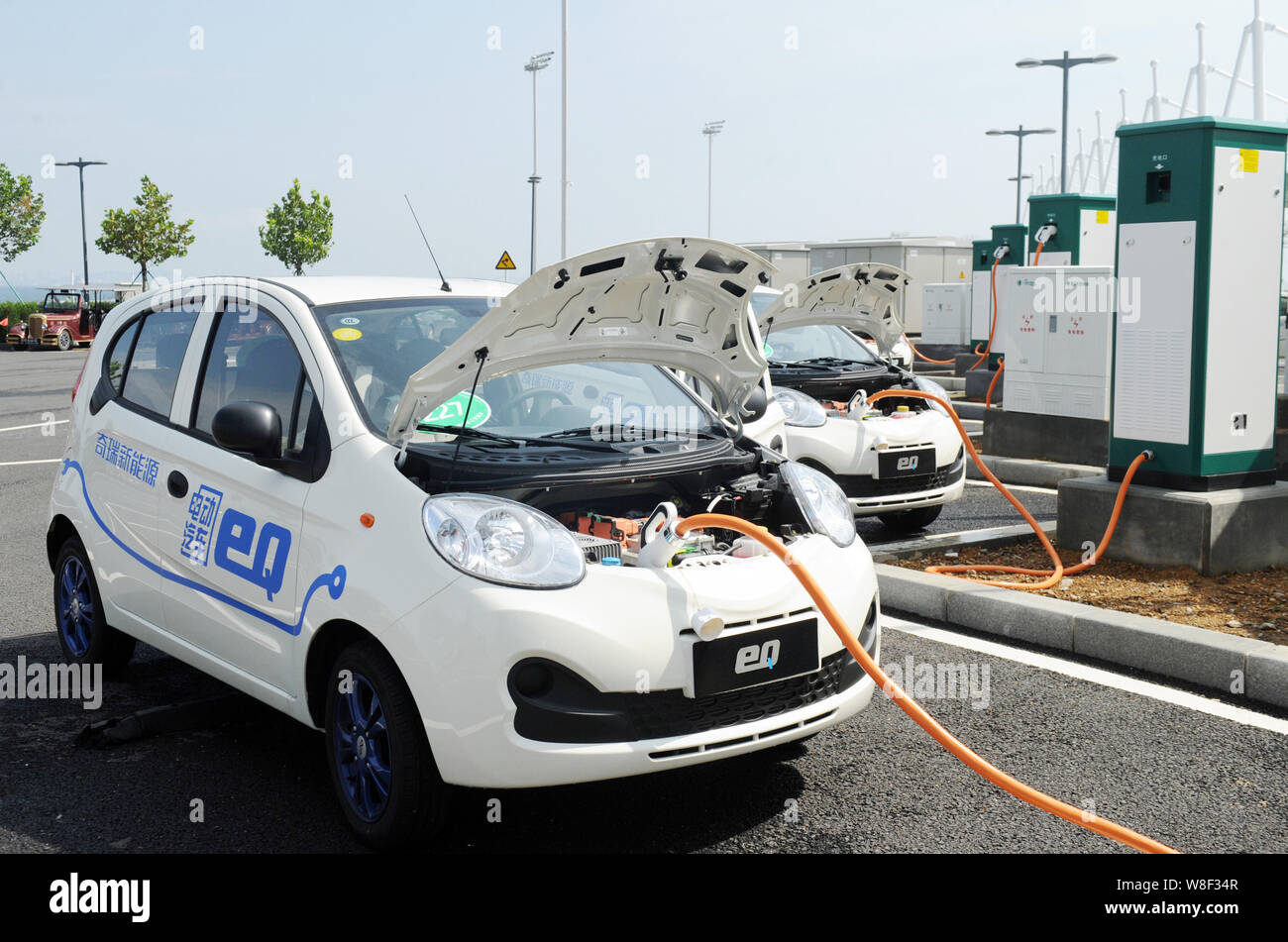 --FILE--Electric cars are being recharged at a charging station in ...