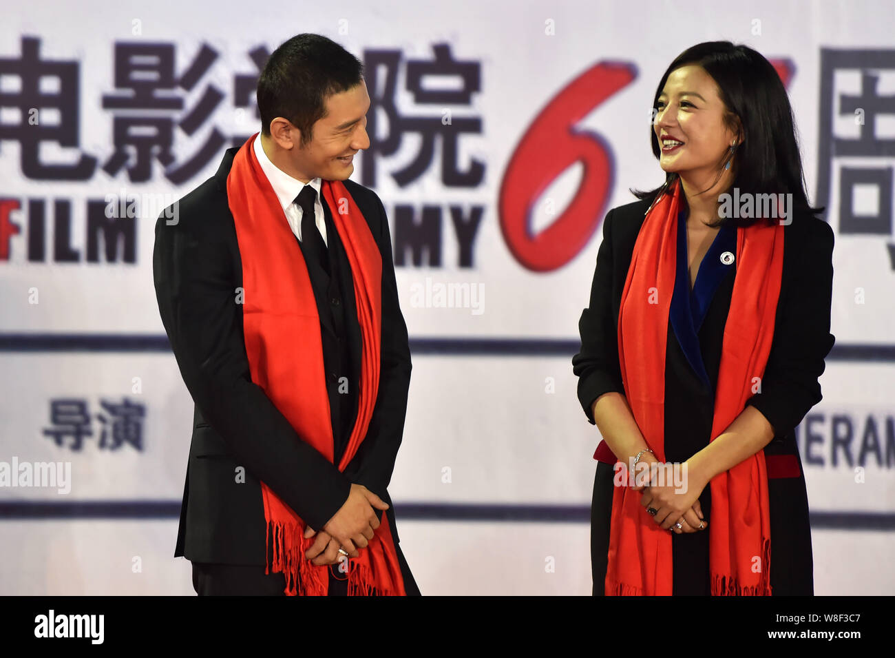 Chinese actress Zhao Wei, right, and actor Huang Xiaoming smile on the ...