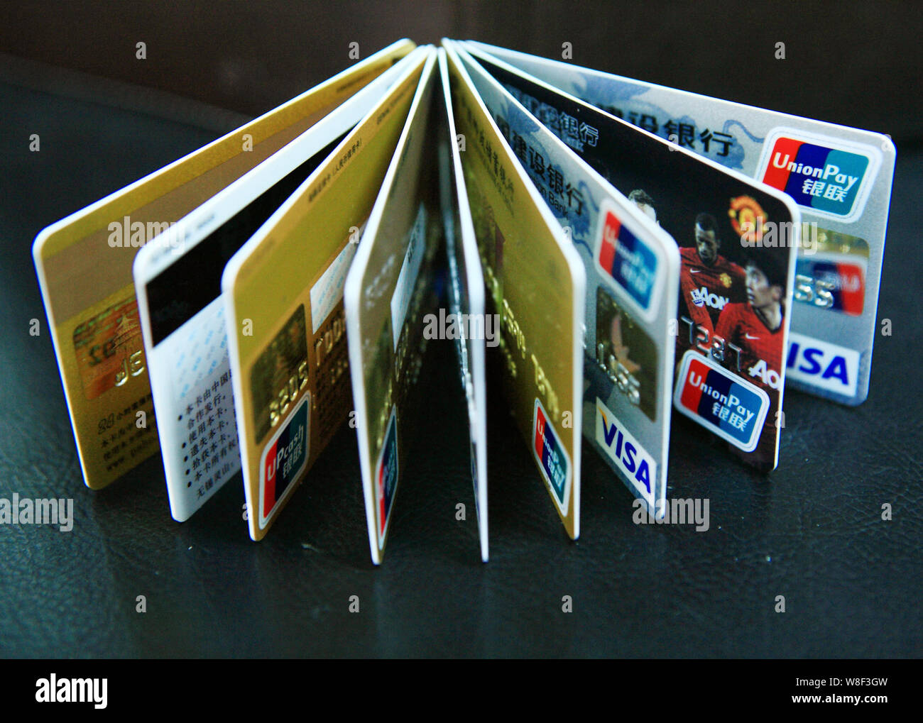 --FILE--Debt and credit cards issued by Chinese banks supported by ...