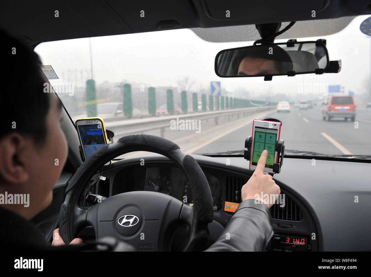 Chinese taxi driver hi-res stock photography and images - Alamy
