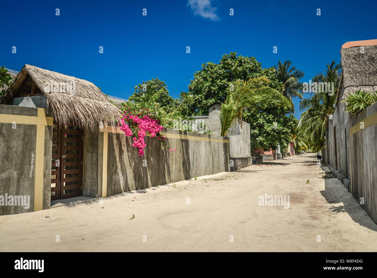 Empty street in traditional Maldivian village on Fehendhoo island, Baa ...