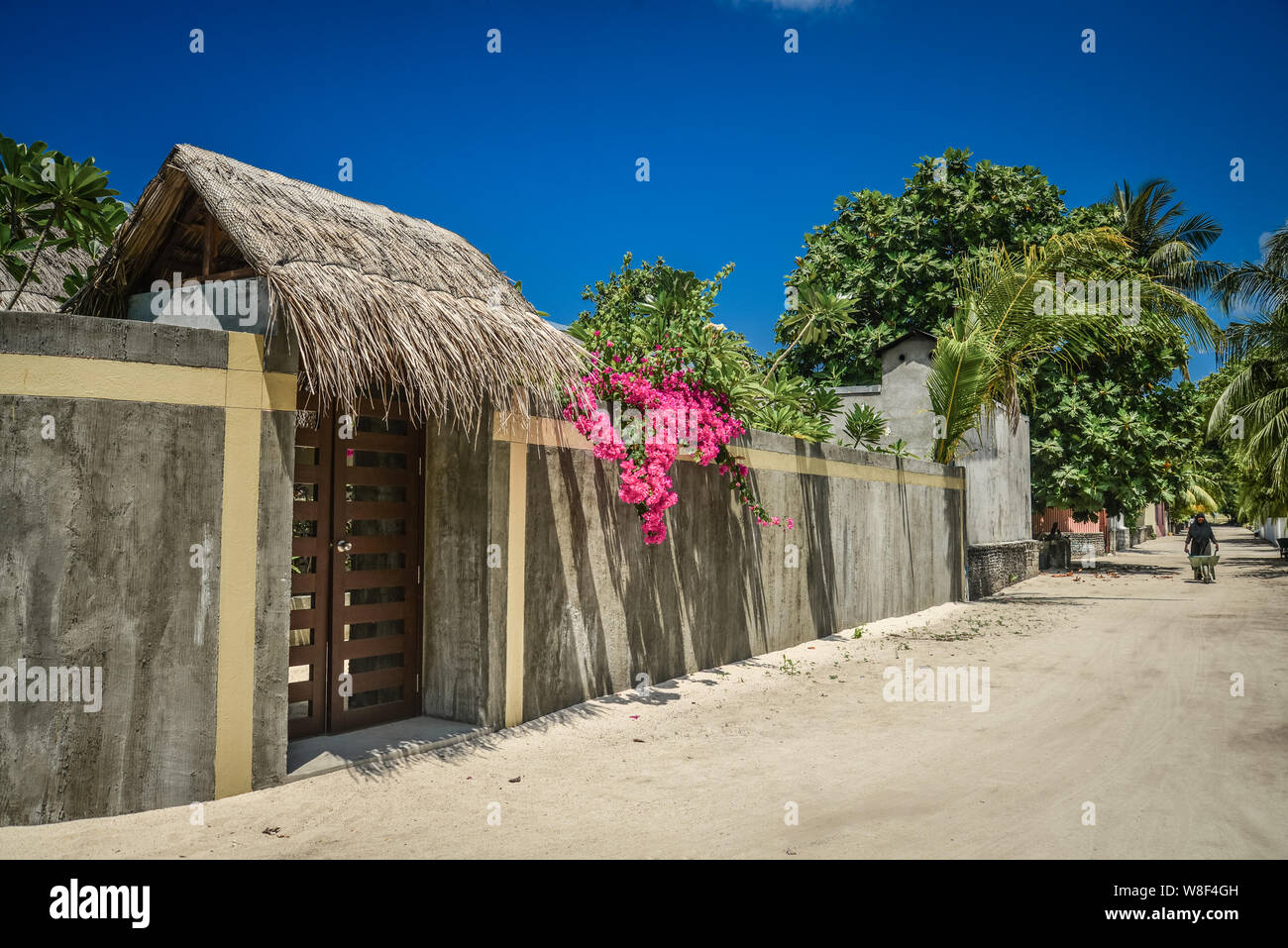 Empty street in traditional Maldivian village on Fehendhoo island, Baa ...