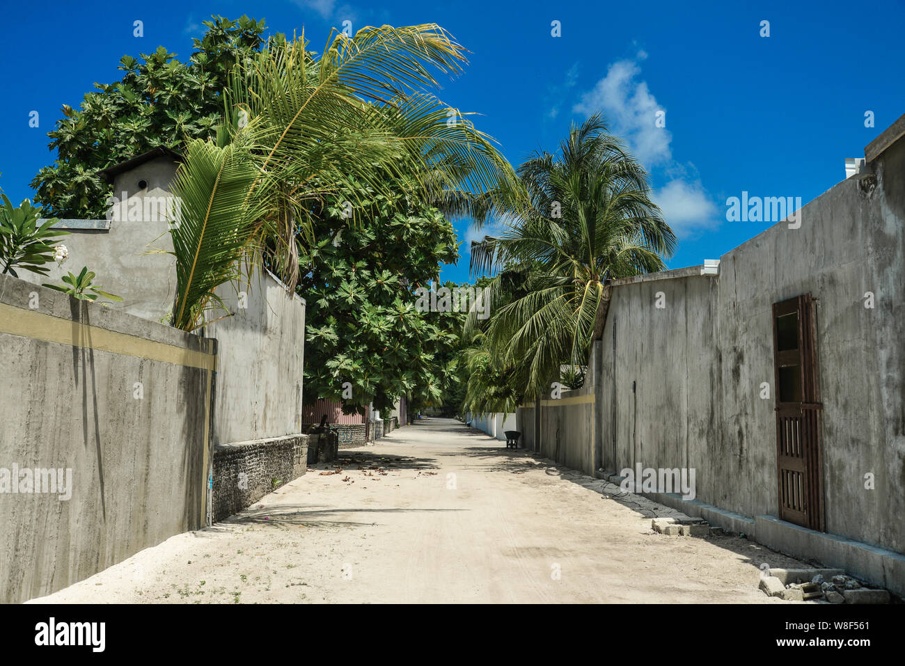 Empty street in traditional Maldivian village on Fehendhoo island, Baa ...