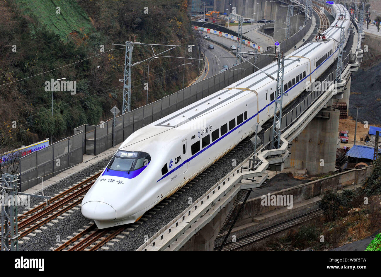 --FILE--A CRH (China Railway High-speed) bullet train travels on the ...