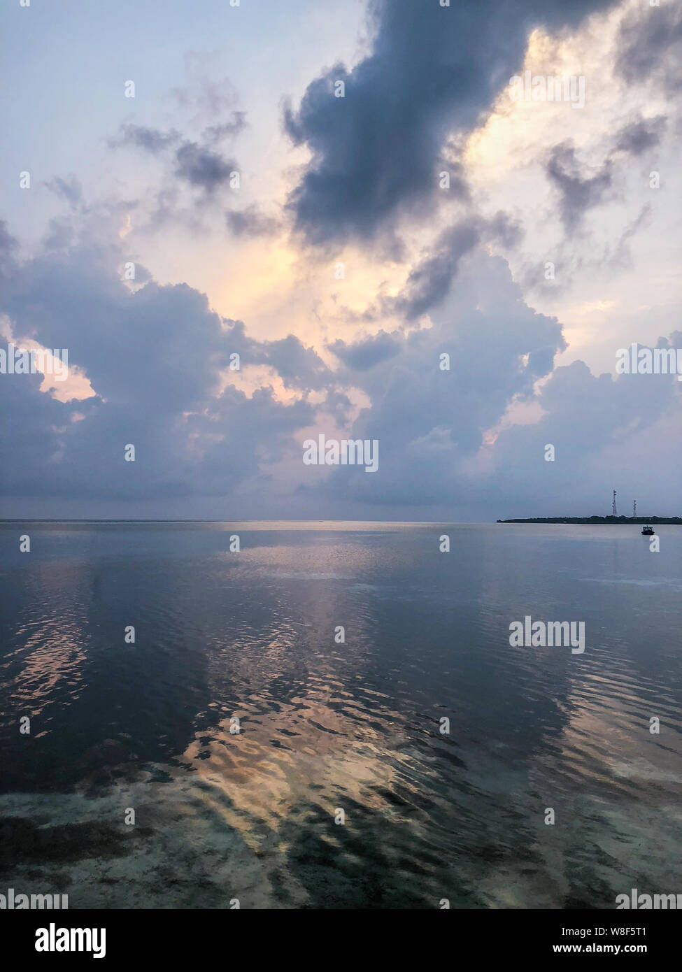 Beautyful sunset in the ocean on Fehendhoo island, Maldives Stock Photo ...