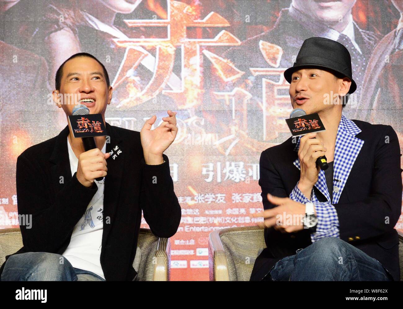 Hong Kong singers and actors Jacky Cheung, left, and Nick Cheung speak ...