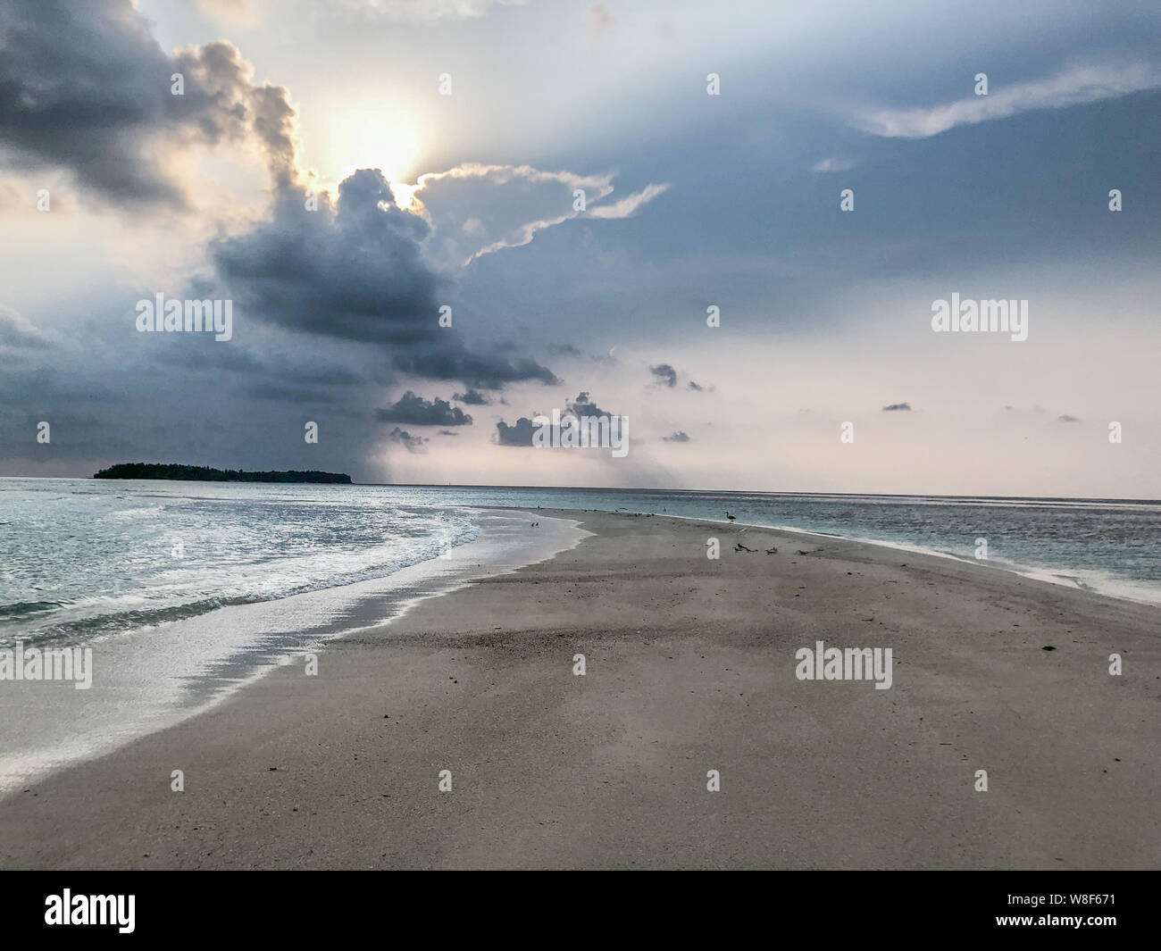 Beautyful sunset in the ocean on sandbank near Fehendhoo island ...