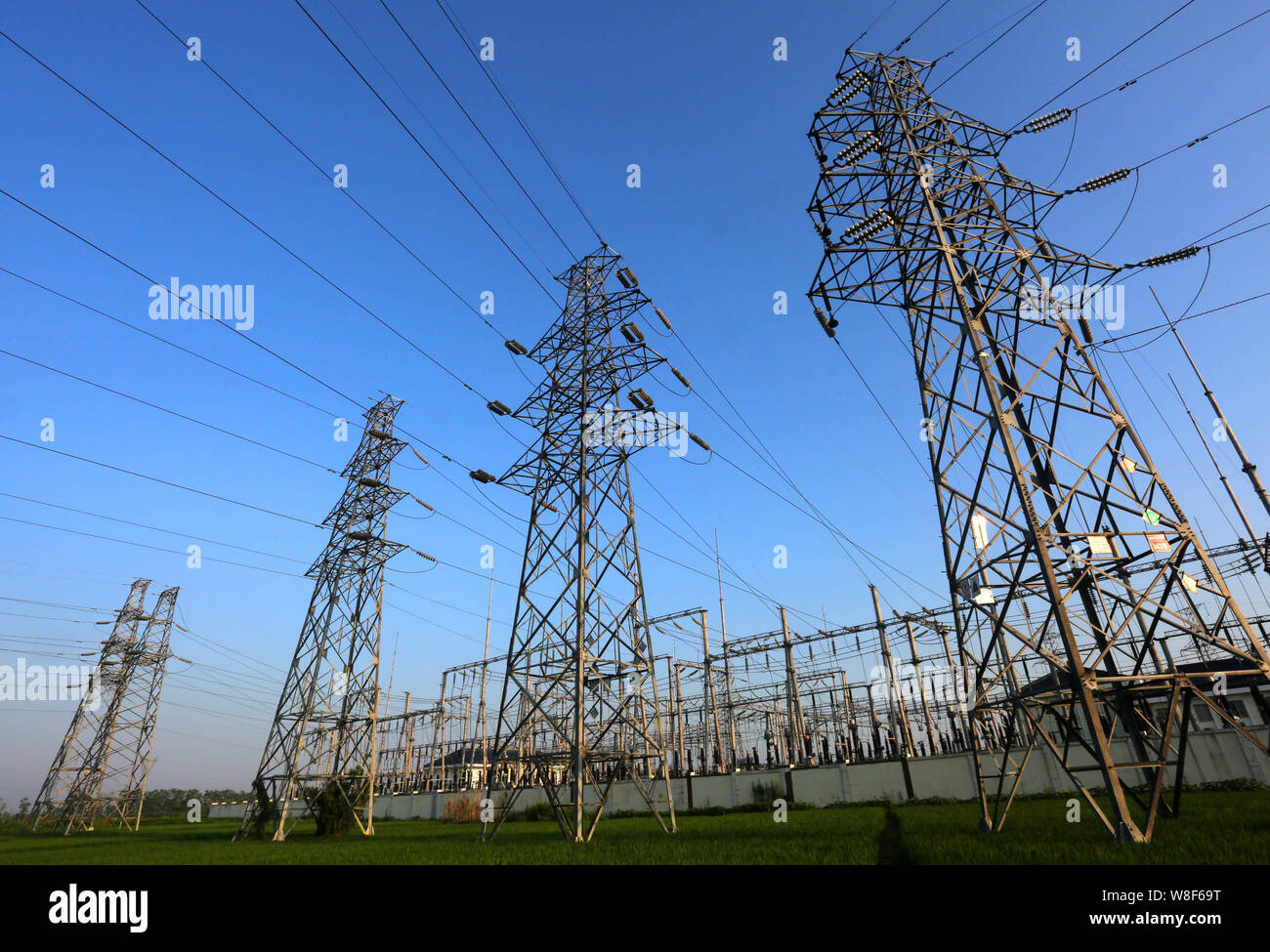 --FILE--High-voltage power lines transmit electricity on pylons in ...