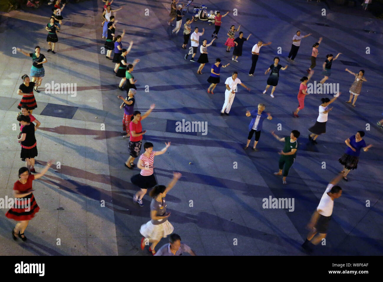 Square dancing chinese hi-res stock photography and images - Alamy