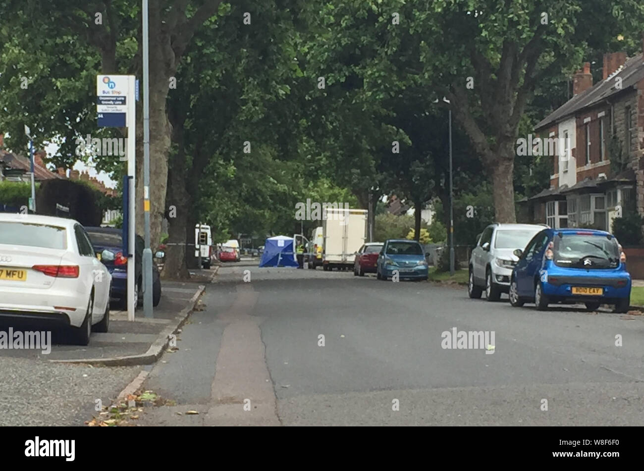A blue forensics tent marking spot near hi-res stock photography and ...