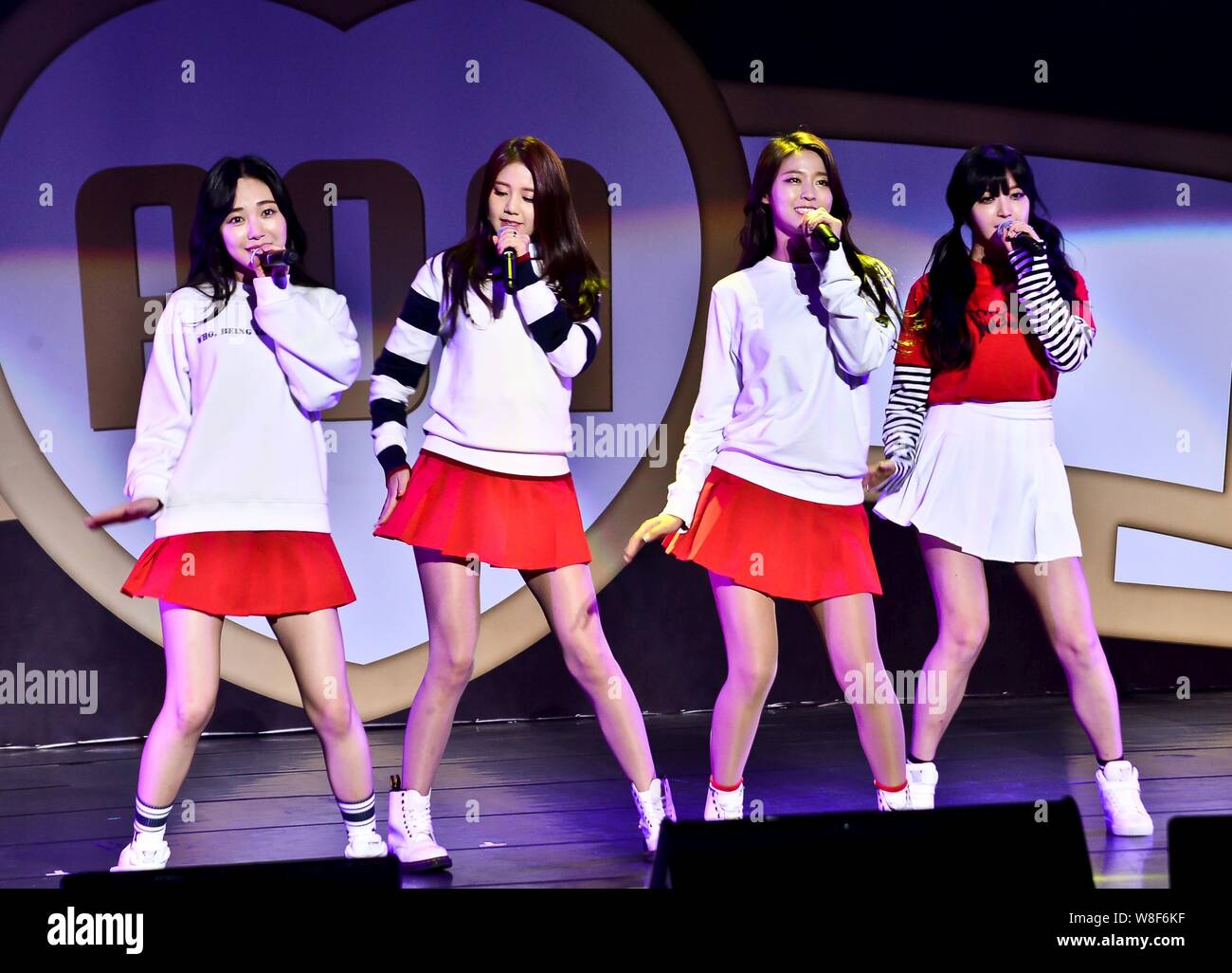 Members of South Korean girl group AOA perform at a fan meeting in ...