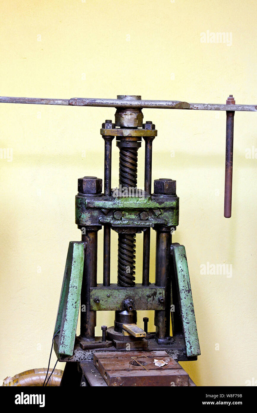 Big heavy mechanic press in retro style Stock Photo - Alamy