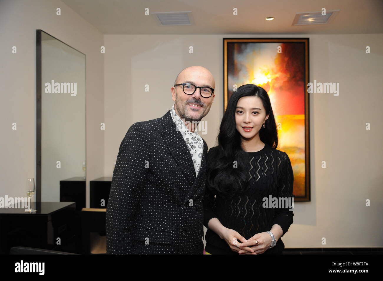 Chinese actress Fan Bingbing (right) poses with executive of Rossano ...