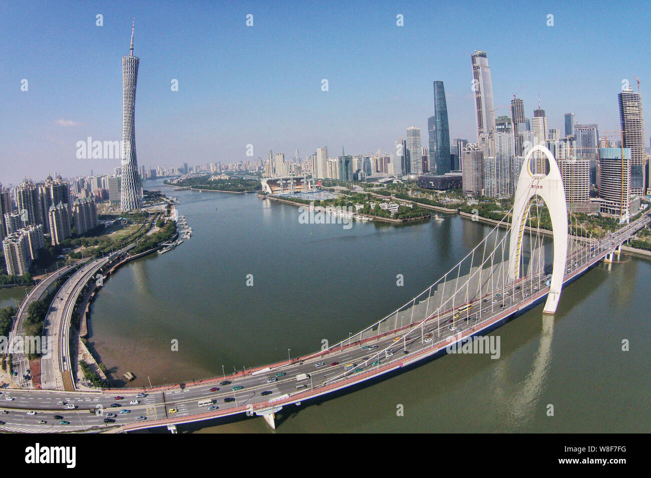 --FILE--View of the Liede Bridge, front, the Canton Tower, tallest, and ...