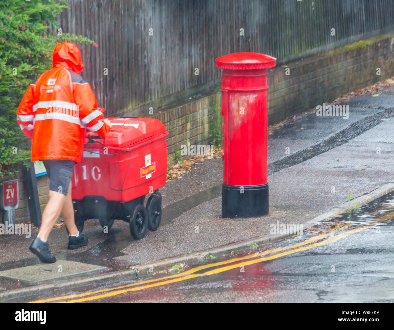 Postman Delivering Letters High Resolution Stock Photography and Images ...