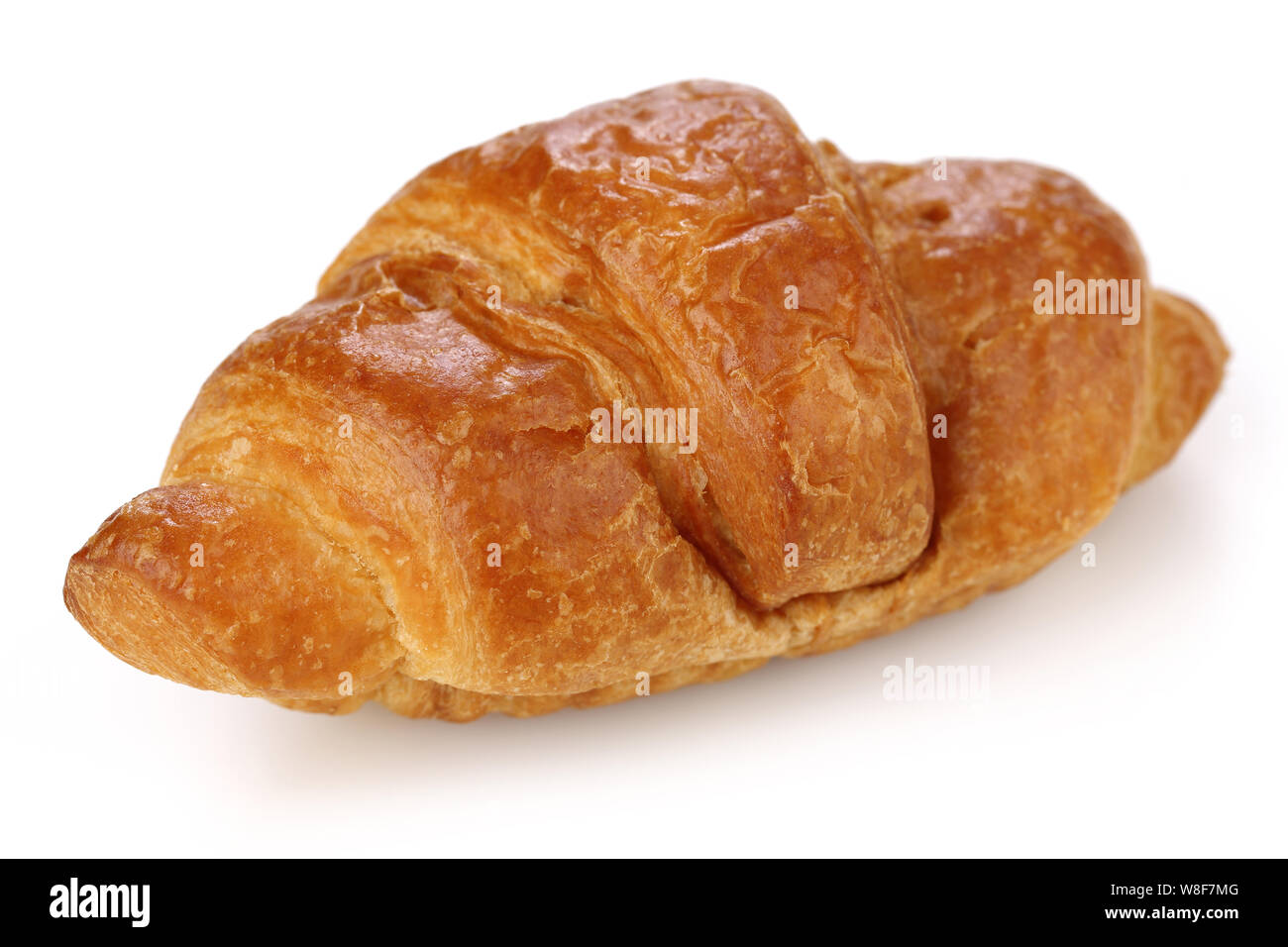 Single croissant isolated on white background Stock Photo - Alamy