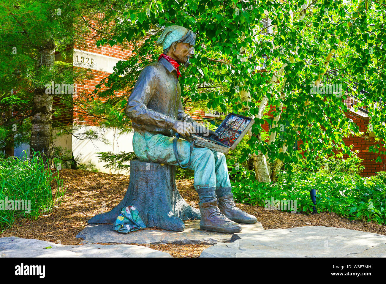 Bronze Statue as seen in front of the city hall in Huntsville, Ontario ...
