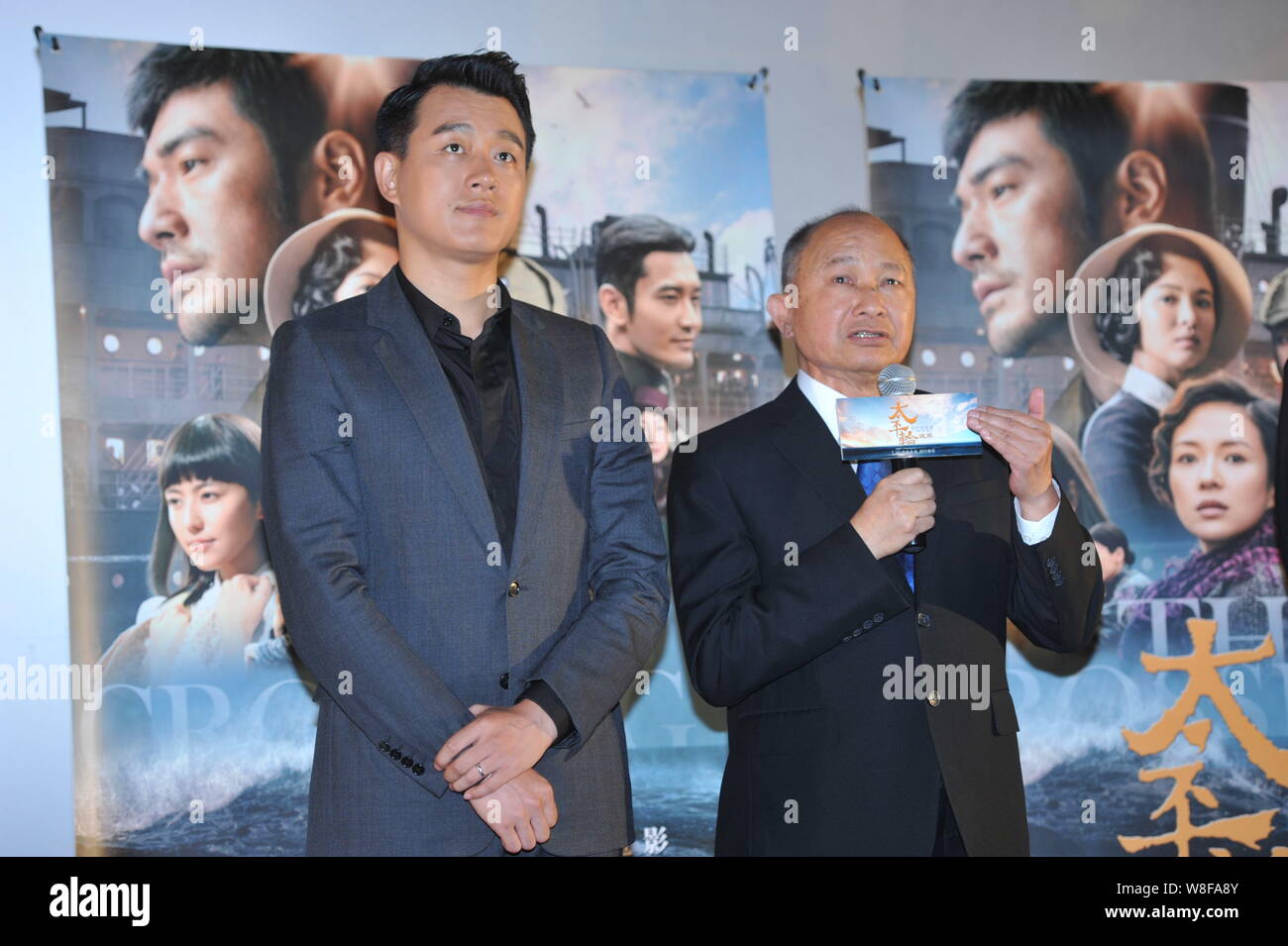 Hong Kong director John Woo, right, and Chinese actor Tong Dawei attend ...