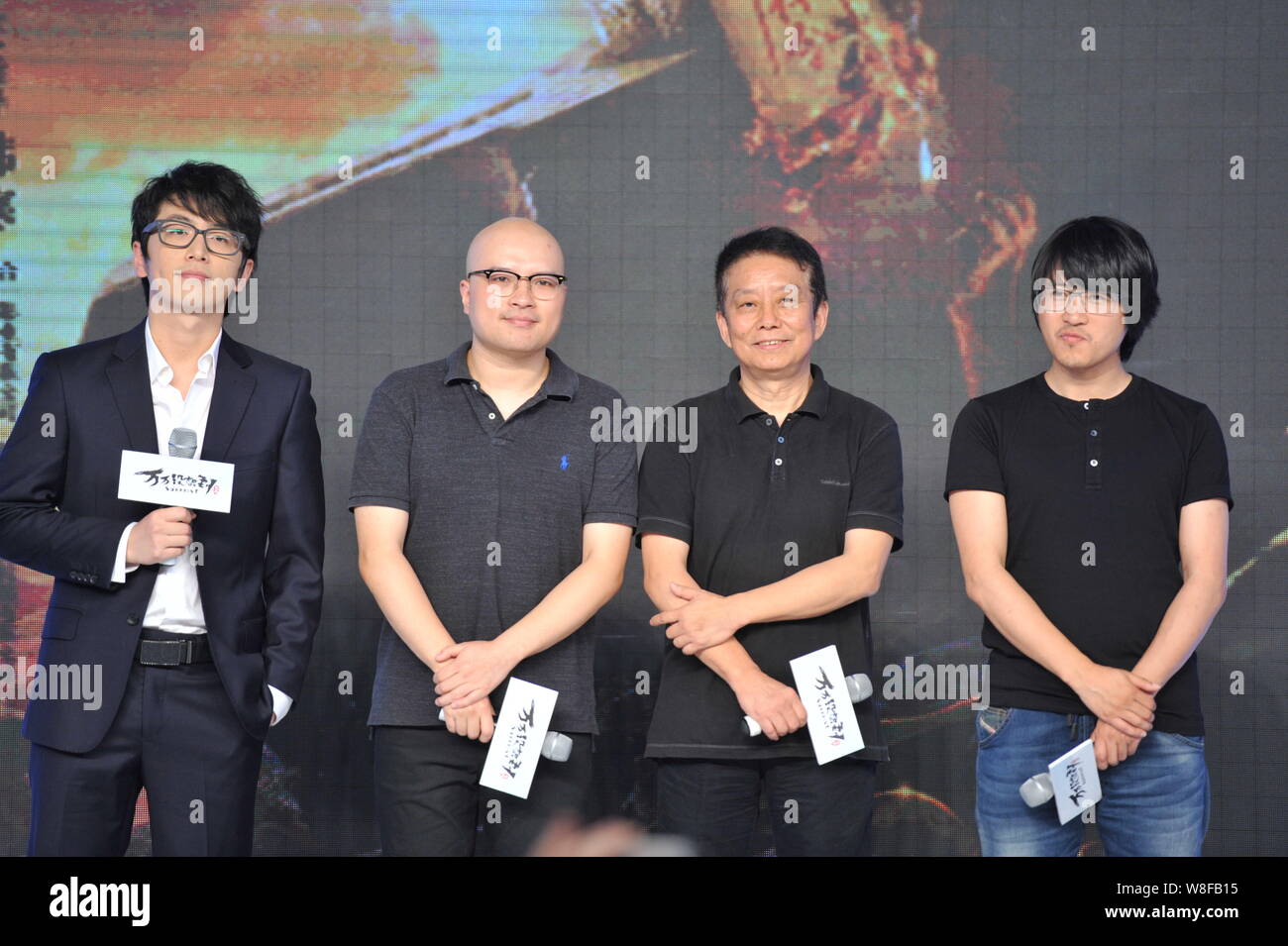 (From left) Chinese actor Luo Hongming, directors Yi Xiaoxing and Huang ...