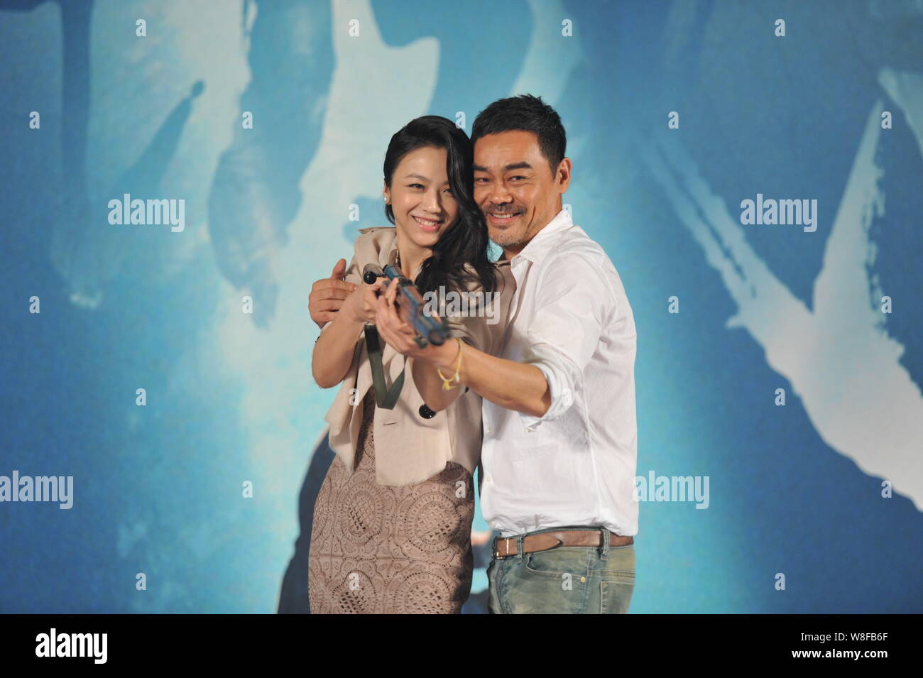Chinese actress Tang Wei, left, and Hong Kong actor Sean Lau pose ...