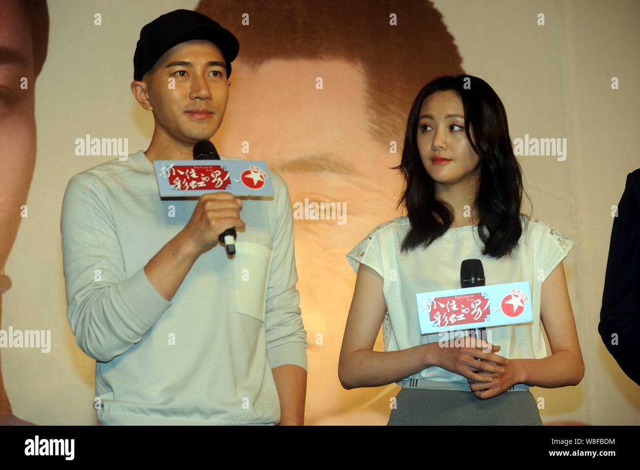 Chinese actress Zheng Shuang, right, and Hong Kong actor Hawick Lau ...