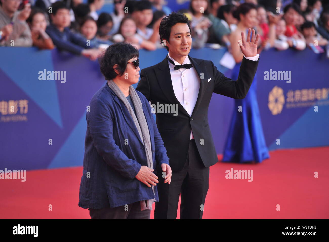South Korean actor Park Hae-il, right, arrives on the red carpet for ...
