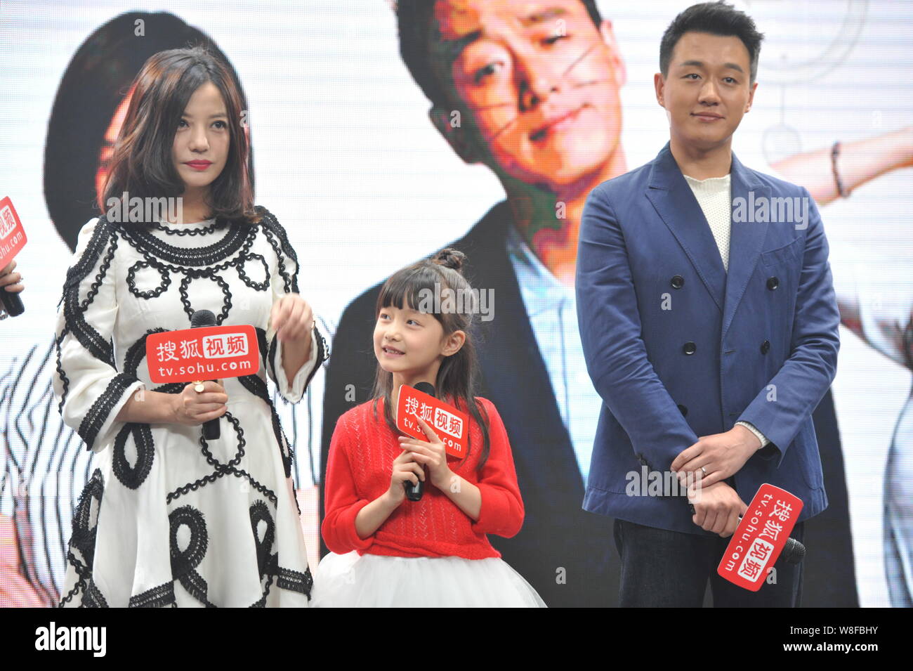 Chinese actress Zhao Wei, left, and actor Tong Dawei, right, pose ...