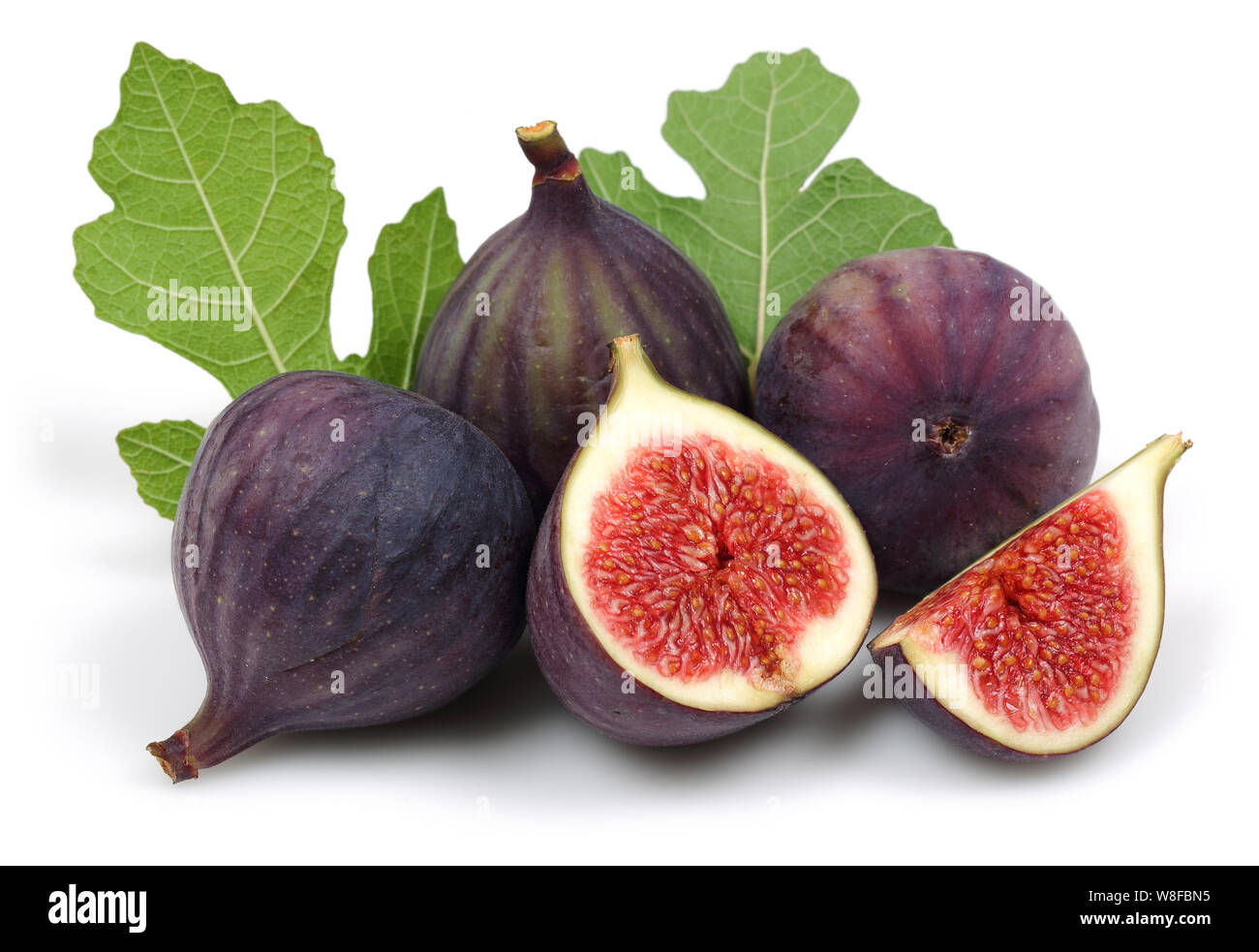 Fresh purple fig fruit and slice with leaf isolated on white background ...