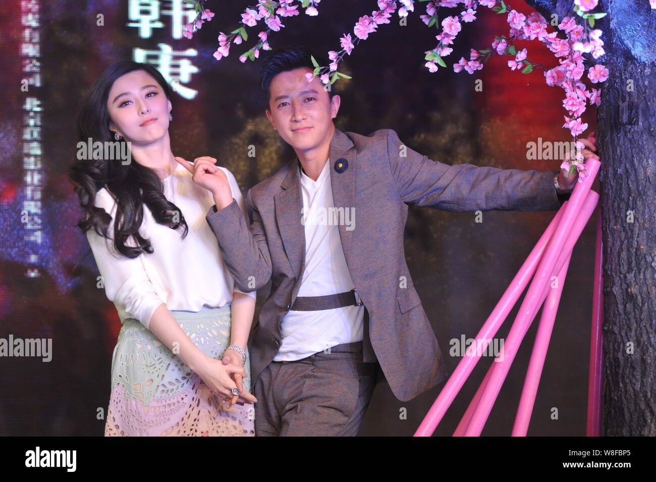 Chinese actress Fan Bingbing, left, and actor Han Geng pose during a ...